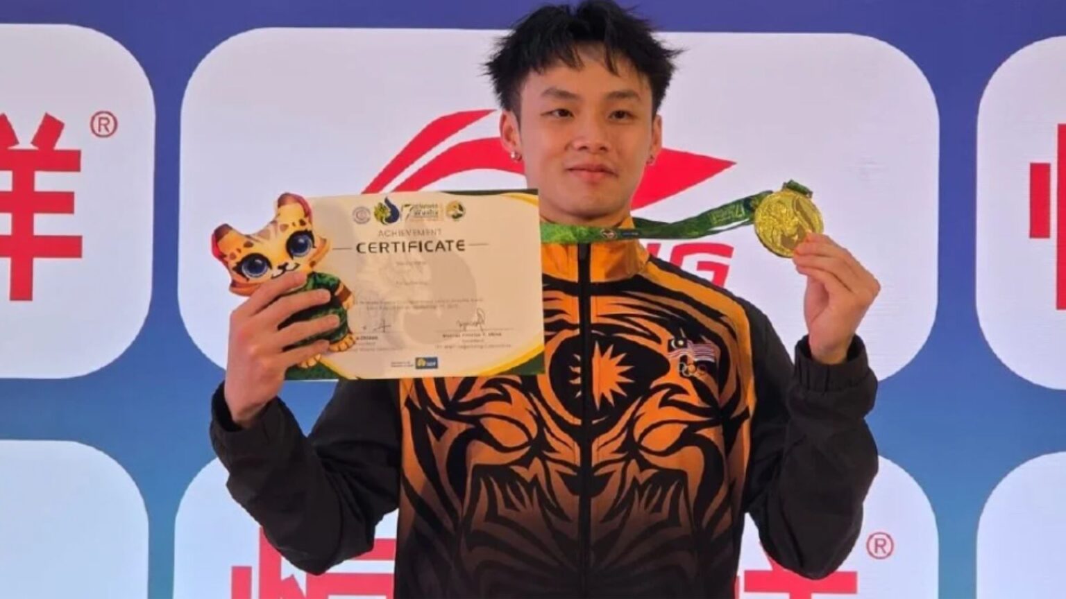 Shin Peng menang emas pertama Kejohanan Dunia Wushu - Channel 10